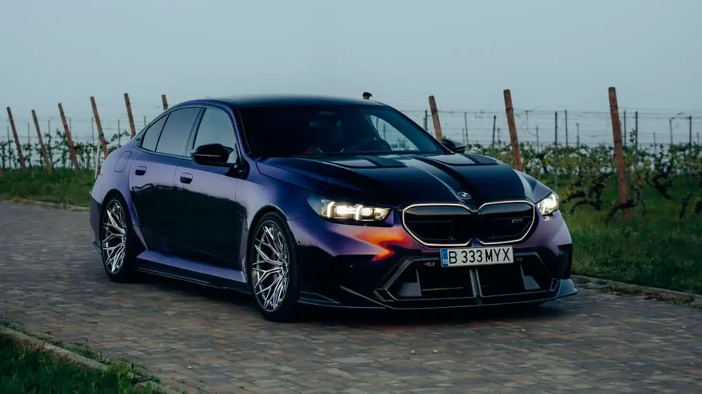 Modified BMW M5 by AL13 Wheels gets purple body, chrome wheels